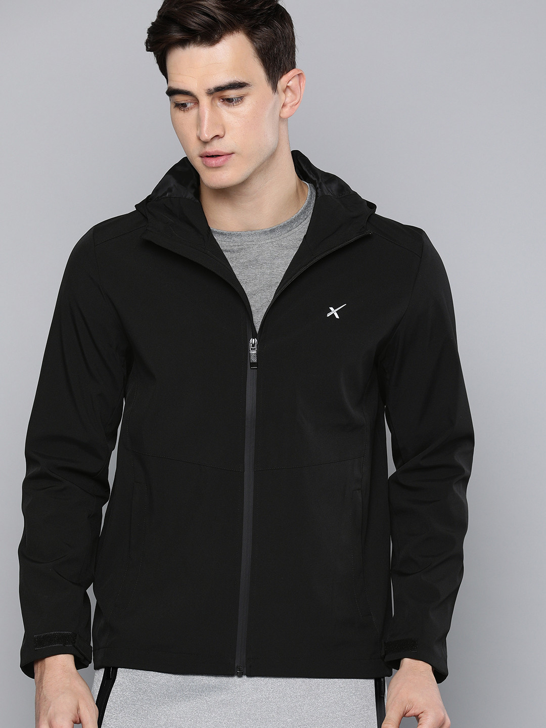 Buy HRX By Hrithik Roshan Men Black Solid Hooded Active Sporty Jacket ...