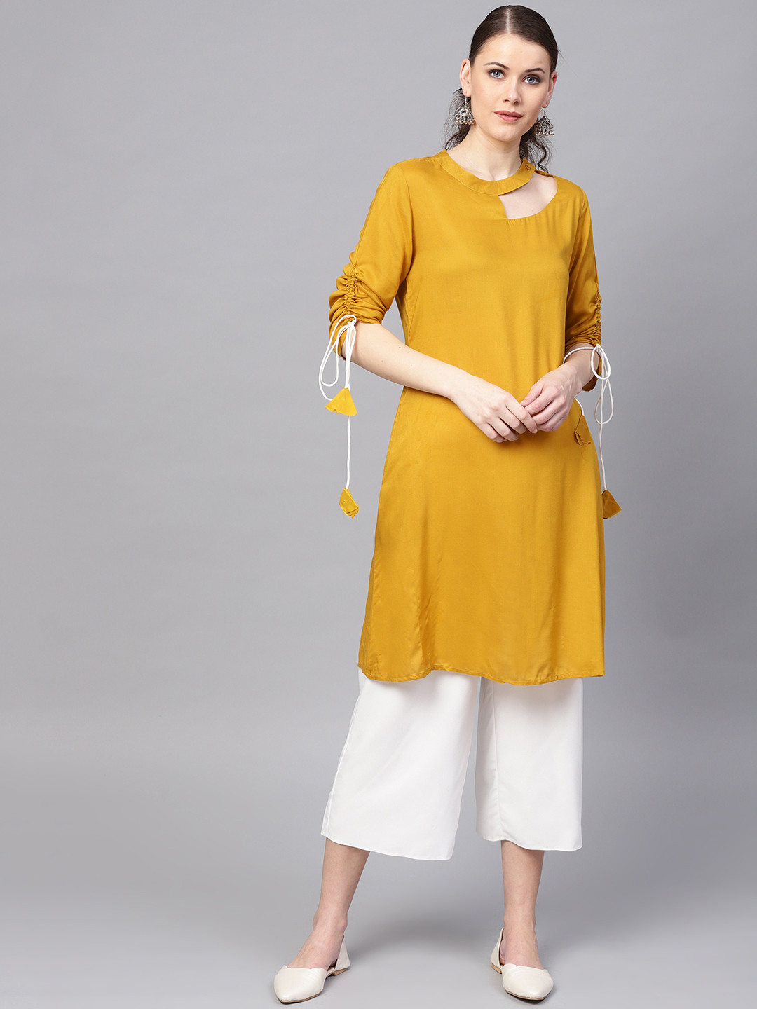Buy RARE ROOTS Women Mustard Yellow Solid Straight Kurta - Kurtas for ...