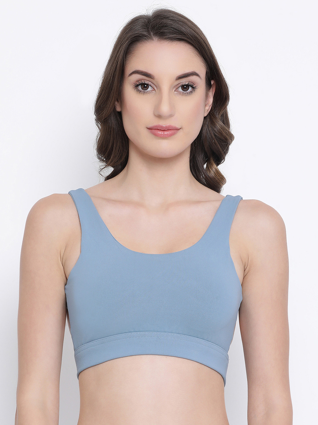 Buy Clovia Blue Solid Padded Non Wired Sports Bra BR1993P03S - Bra for ...