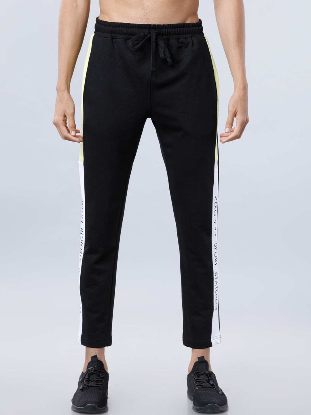 Buy LOCOMOTIVE Men Black & White Solid Slim Fit Cropped Track Pants ...