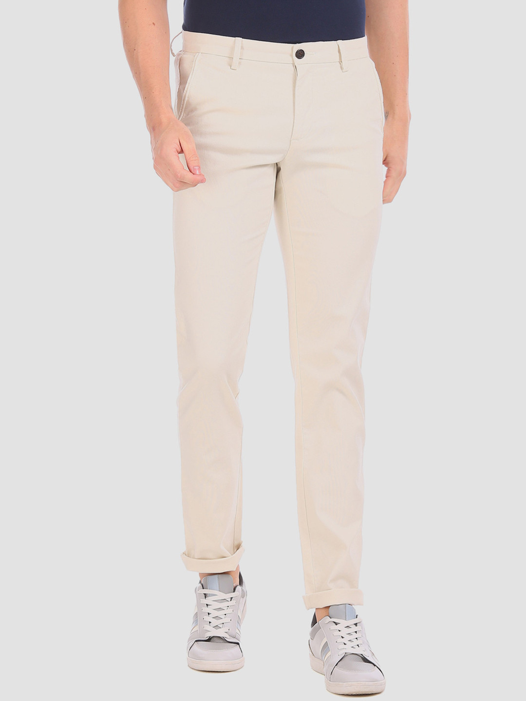Buy Arrow Men Cream Coloured Regular Fit Solid Chinos - Trousers for ...