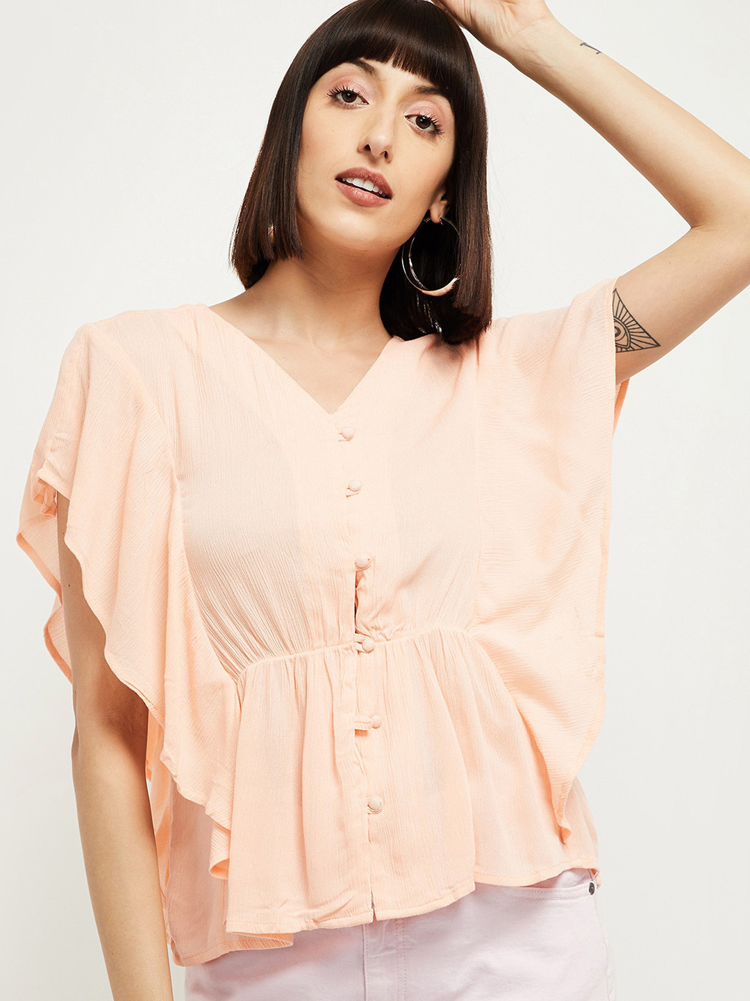Buy Max Women Peach Coloured Solid Peplum Top - Tops for Women 13599068 ...