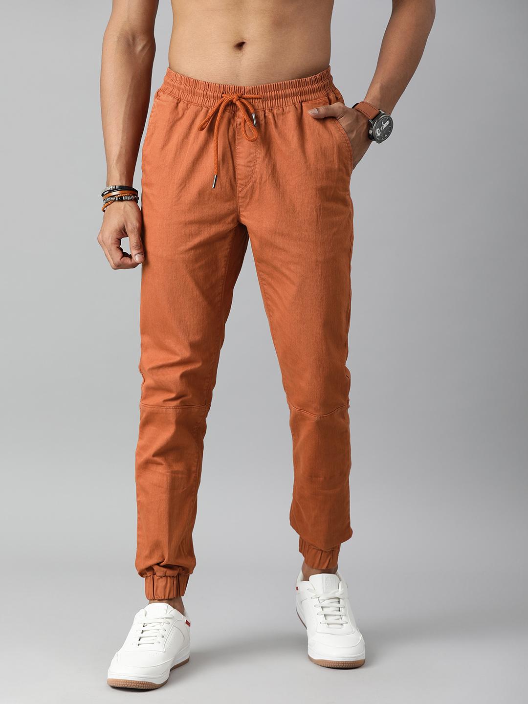 Buy Roadster Men Rust Orange Solid Joggers - Trousers for Men 12920614 ...