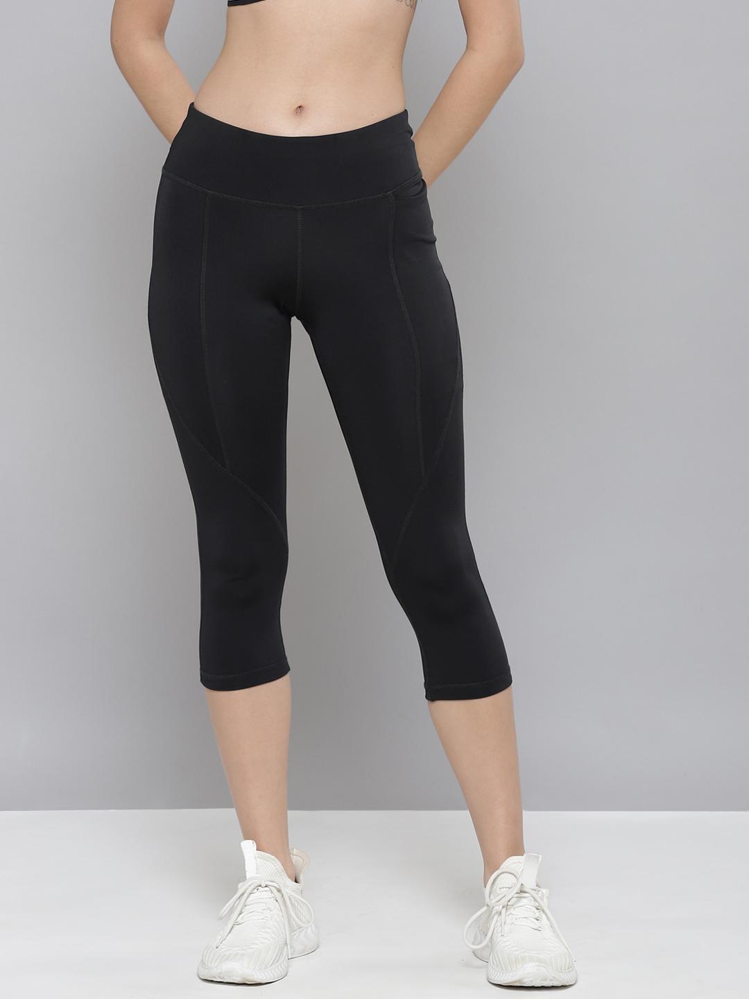 Buy Reebok Women Black PP Solid Training Capri Tights - Capris for ...