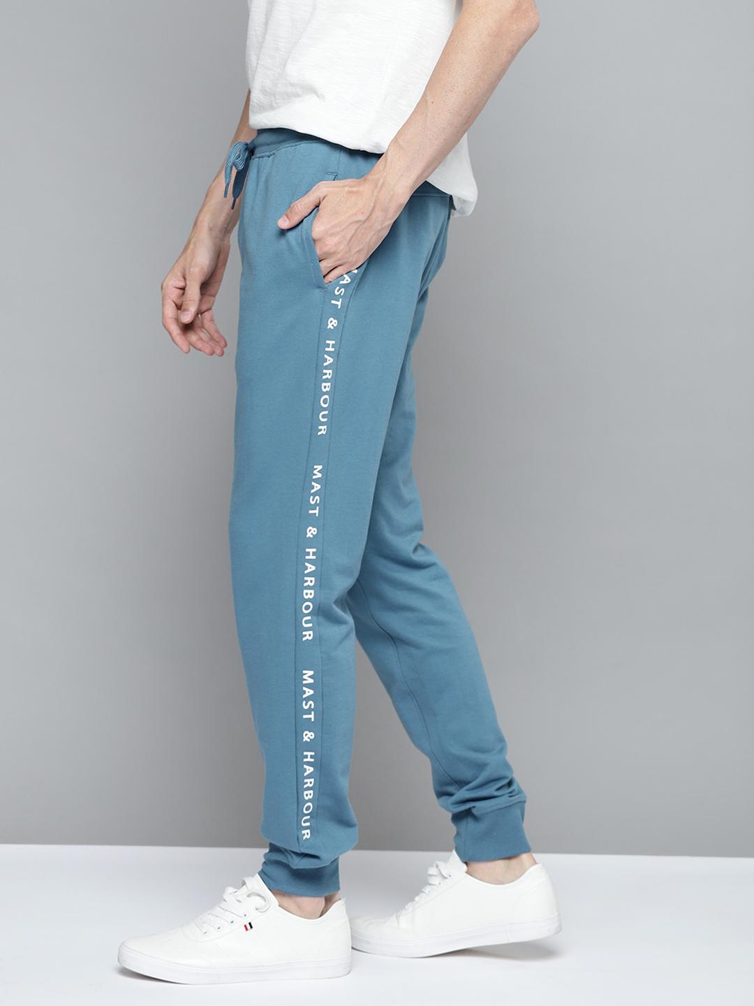Buy Mast & Harbour Men Blue Solid Joggers With Side Striped Detail ...