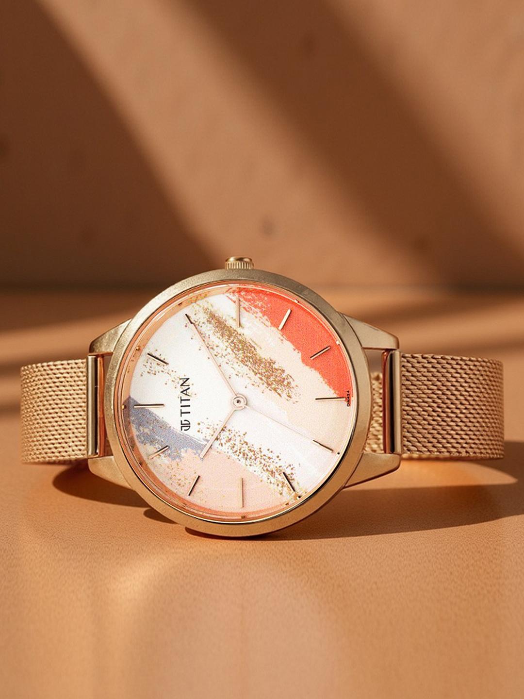 Buy Titan Women Rose Gold Toned Brass Printed Dial Bracelet Style ...