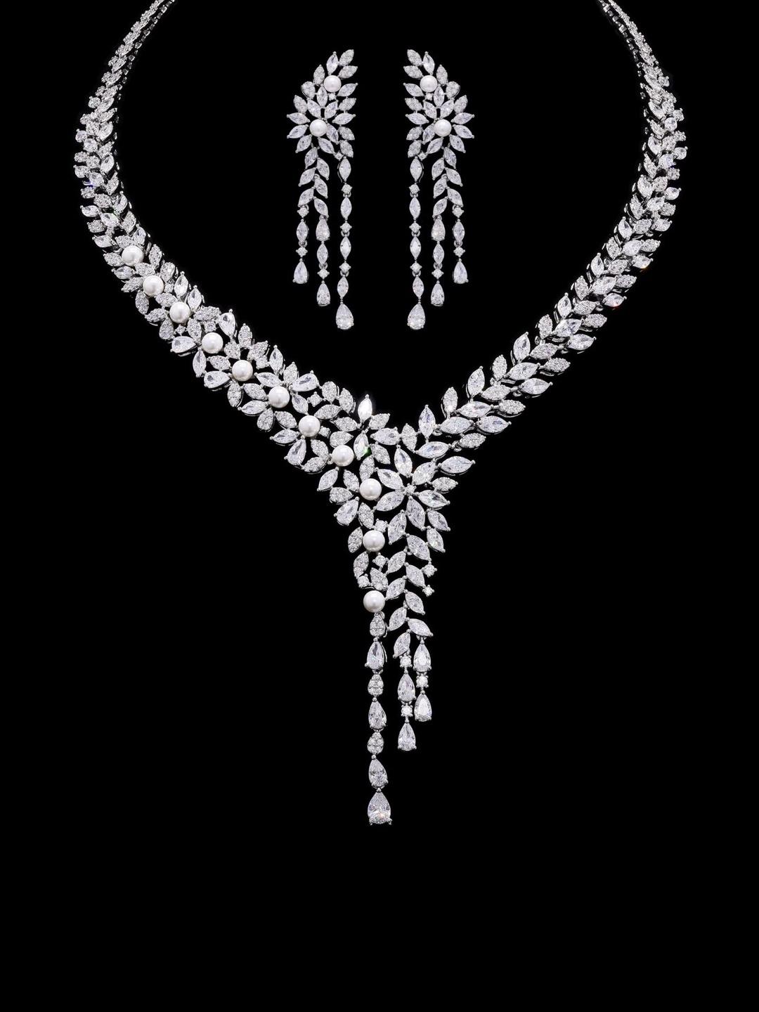 Buy Twenty One Jewels Rhodium Plated Cubic Zircon Studded Jewellery Set ...