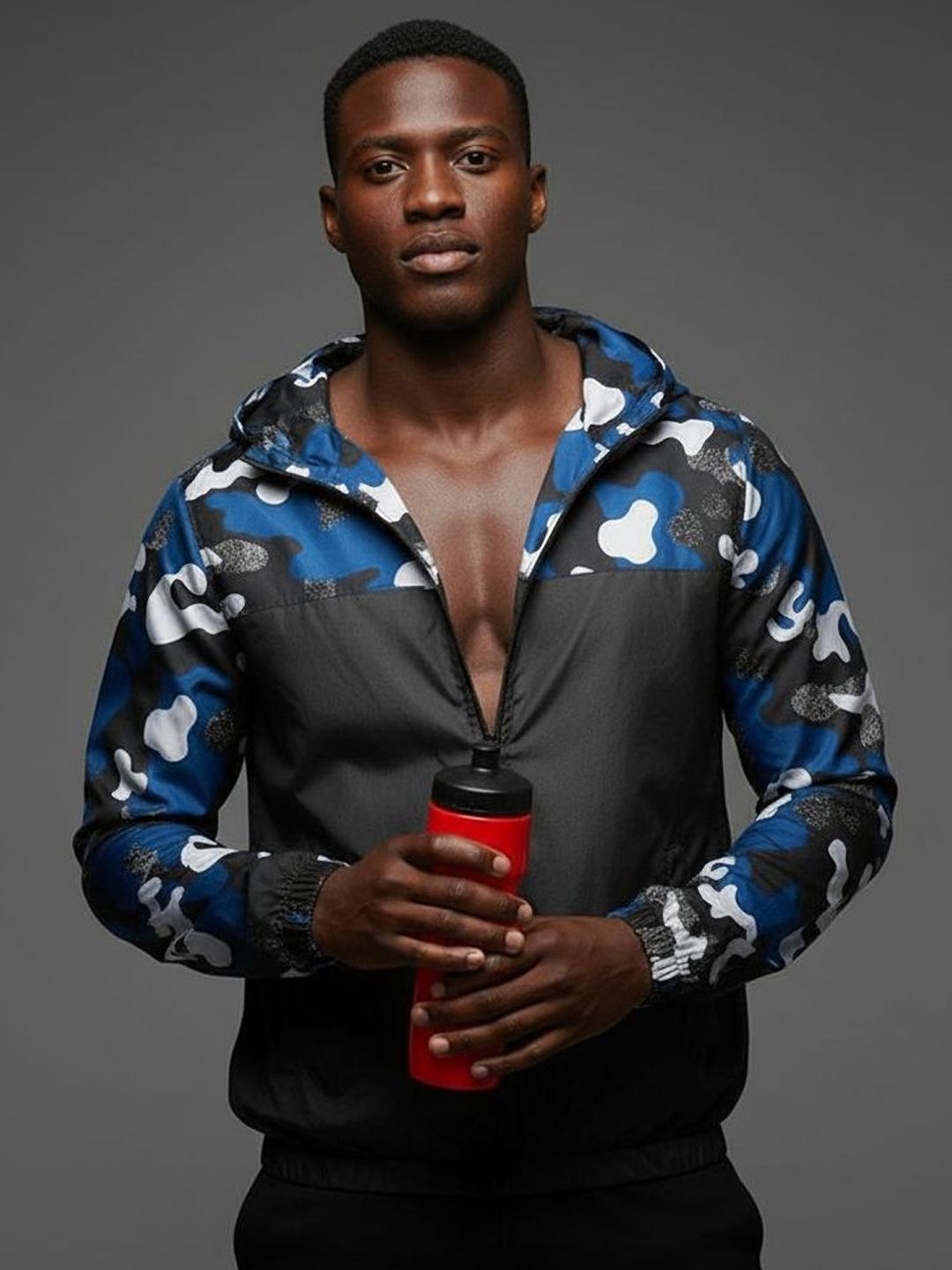 Buy HRX By Hrithik Roshan Men Hooded Camouflage Printed Windcheater ...