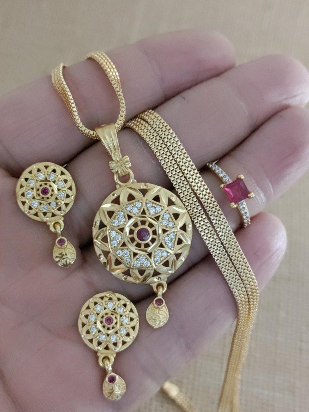 Buy OM KRISHIV COLLECTION Gold Plated Artificial Stones Studded Traditional Jewellery Set ...