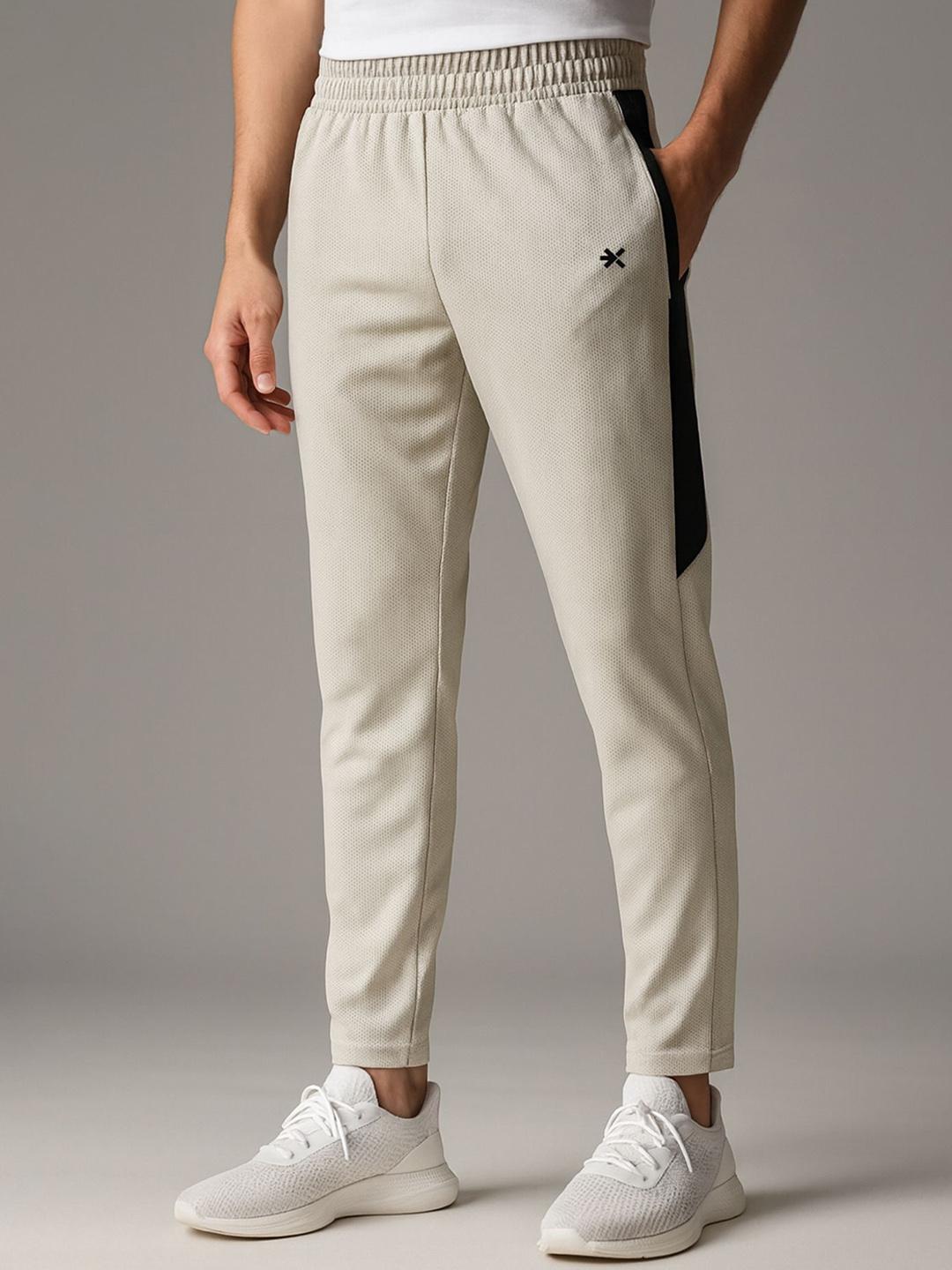 Buy HRX By Hrithik Roshan Men Striped Mid Rise Cricket Track Pant ...