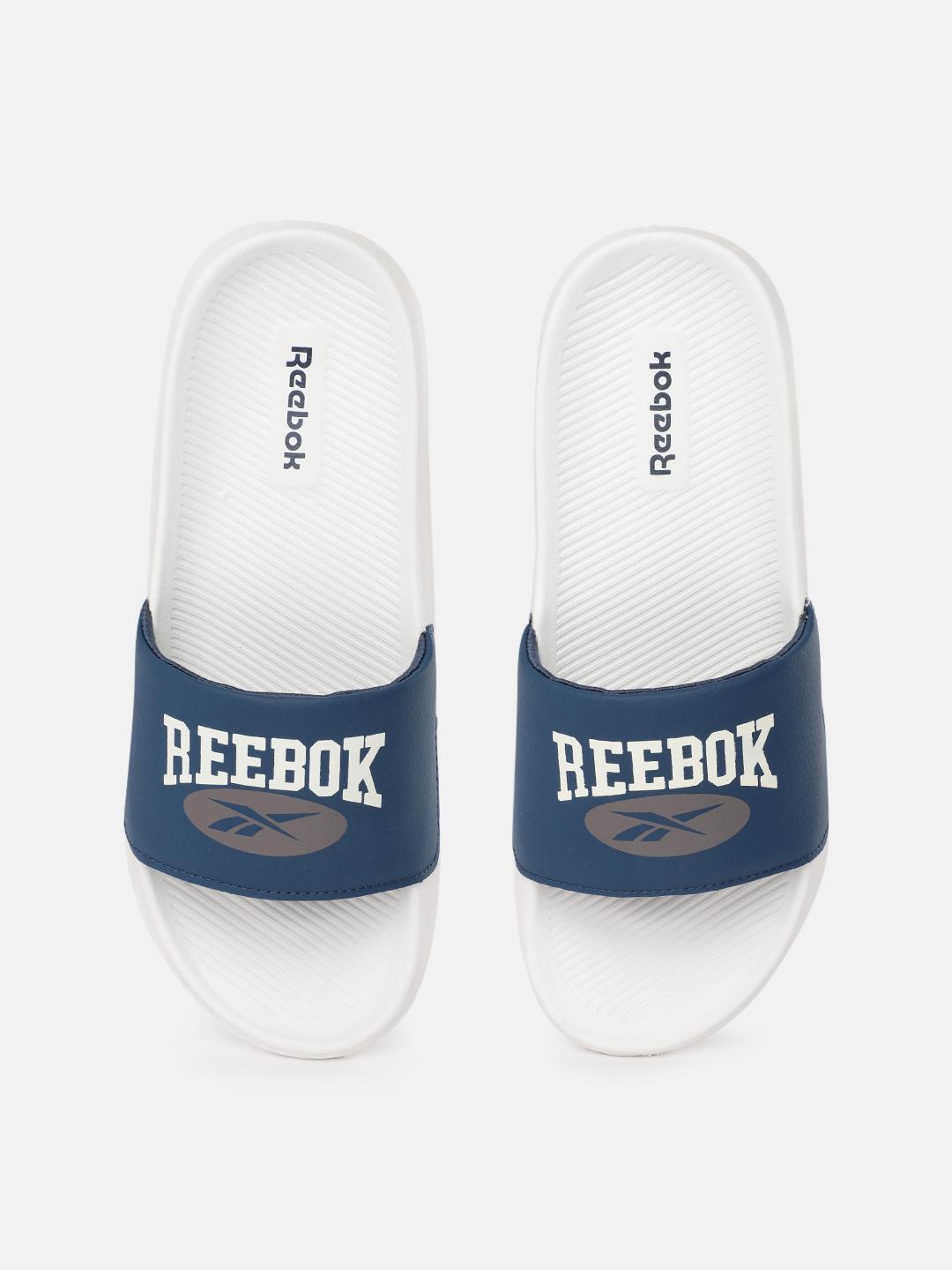 Buy Reebok Men Zylo Brand Logo Printed Sliders - Flip Flops for Men ...