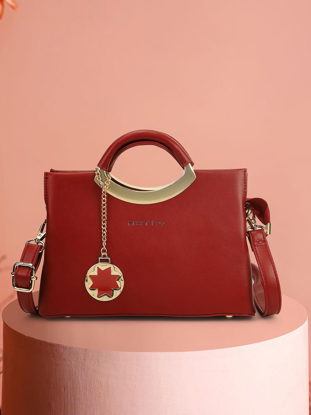 Buy Metro Women Solid Structured Tasselled Handheld Bag - Handbags for ...