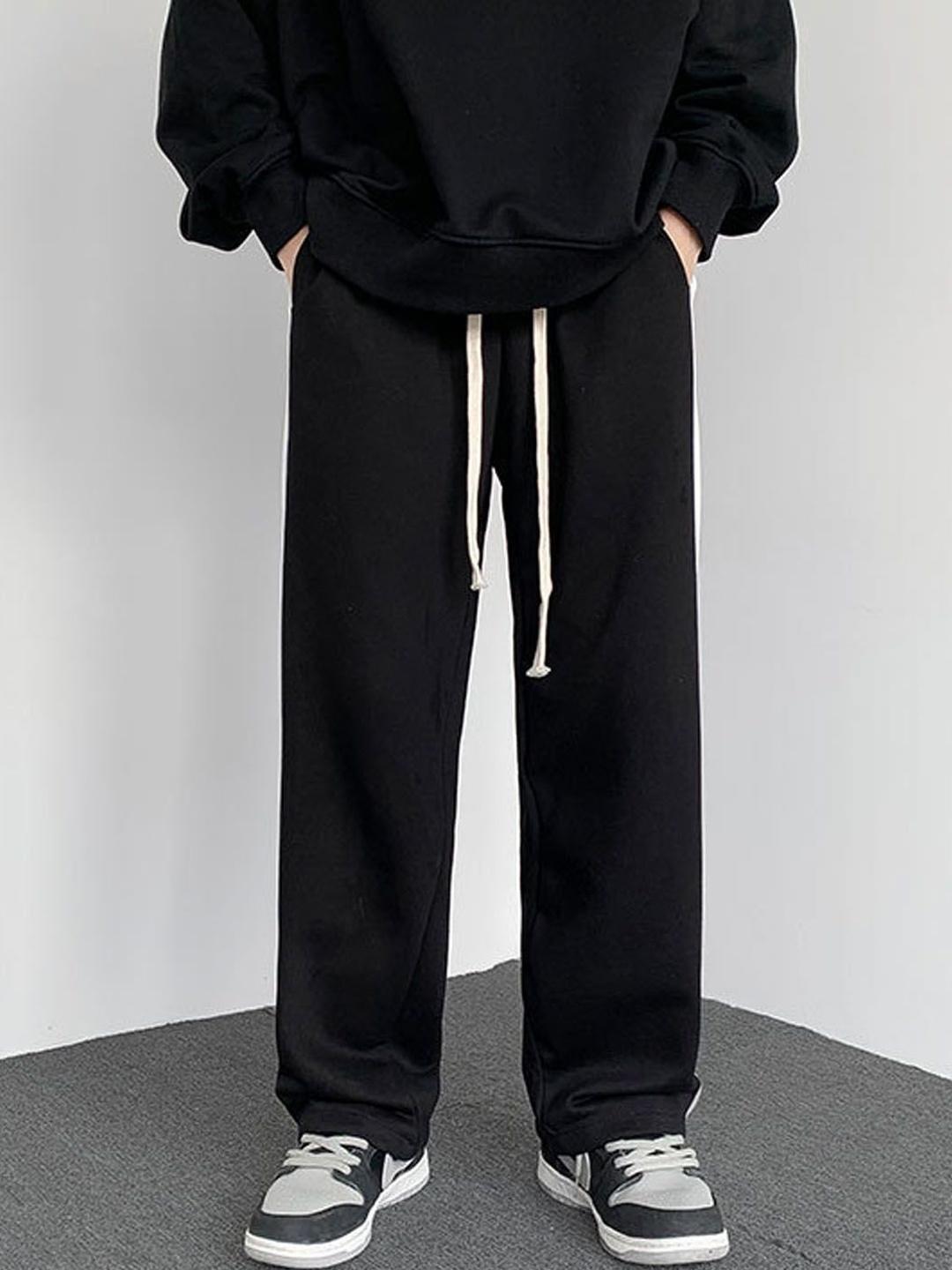 Buy Suo Men Colourblocked Striped Loose Fit Easy Wash Trousers ...