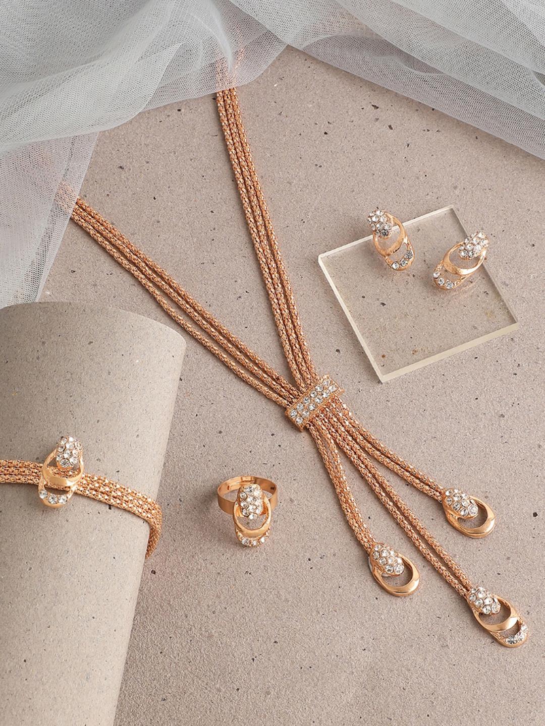 Buy SOHI Women Rose Gold Toned White Stone Studded Jewellery Set ...