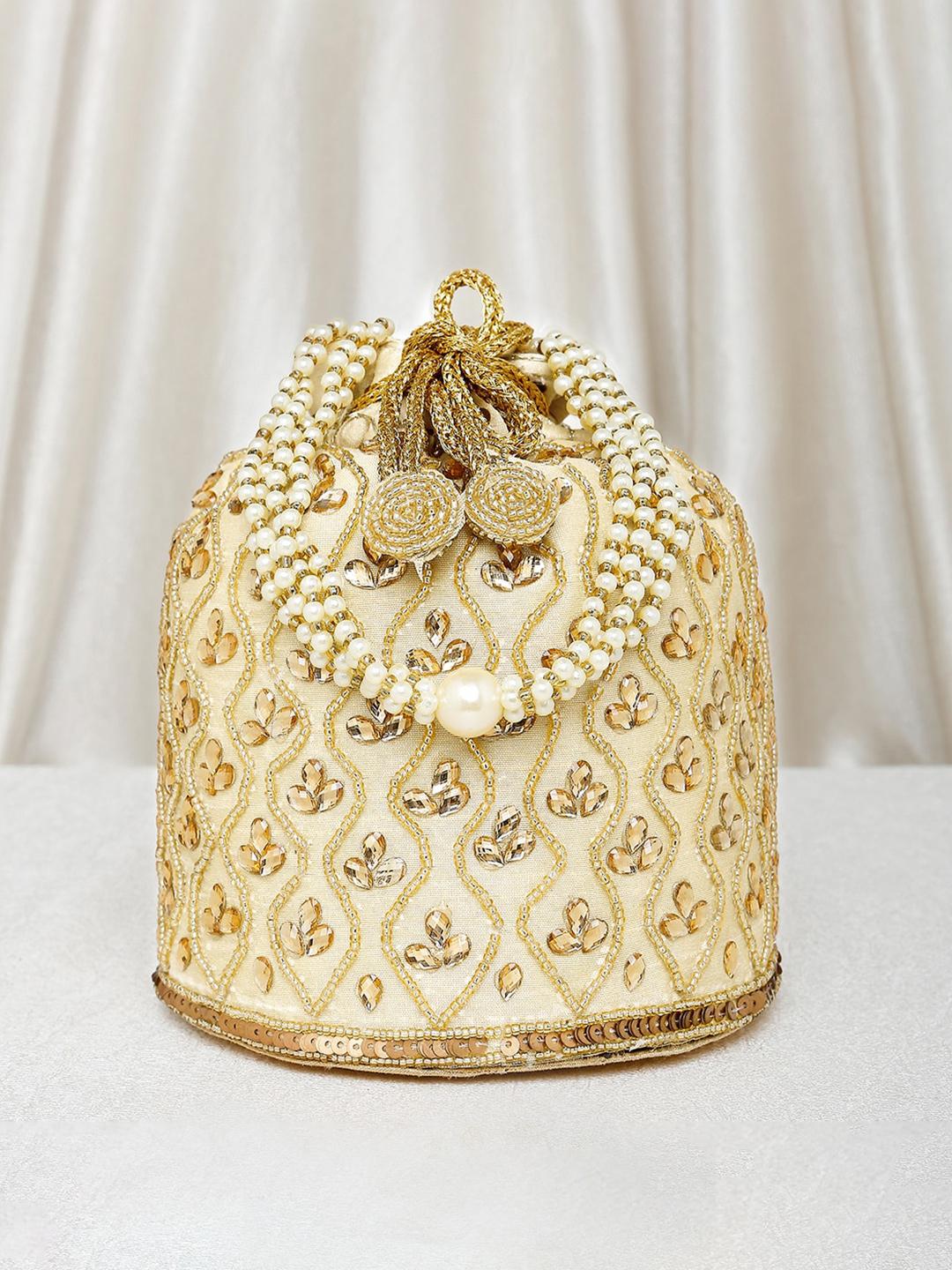 Buy Peora Cream Coloured & Gold Toned Embellished Potli Clutch ...