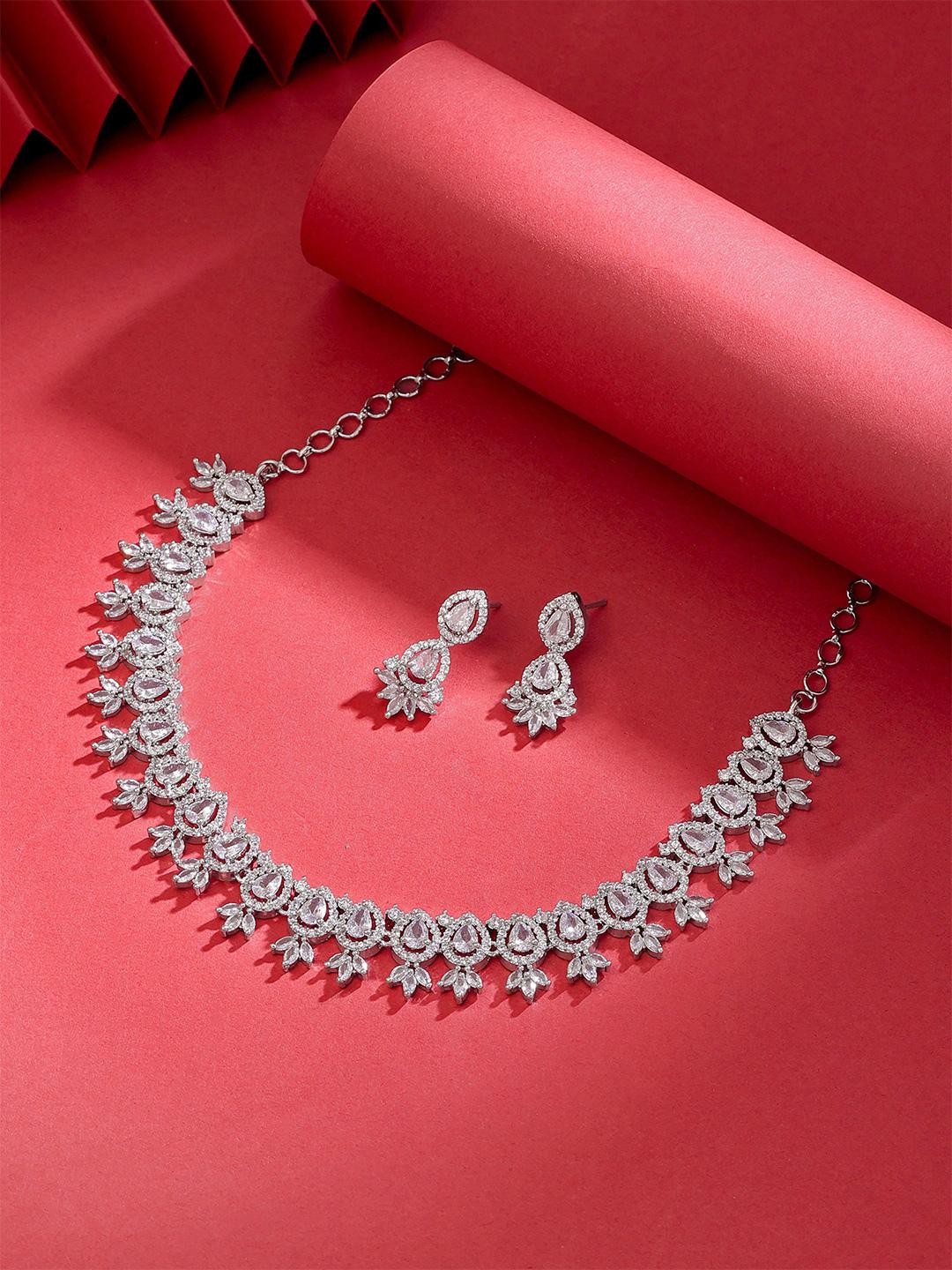 Buy Yellow Chimes Rhodium Plated American Diamond Studded Jewellery Set ...
