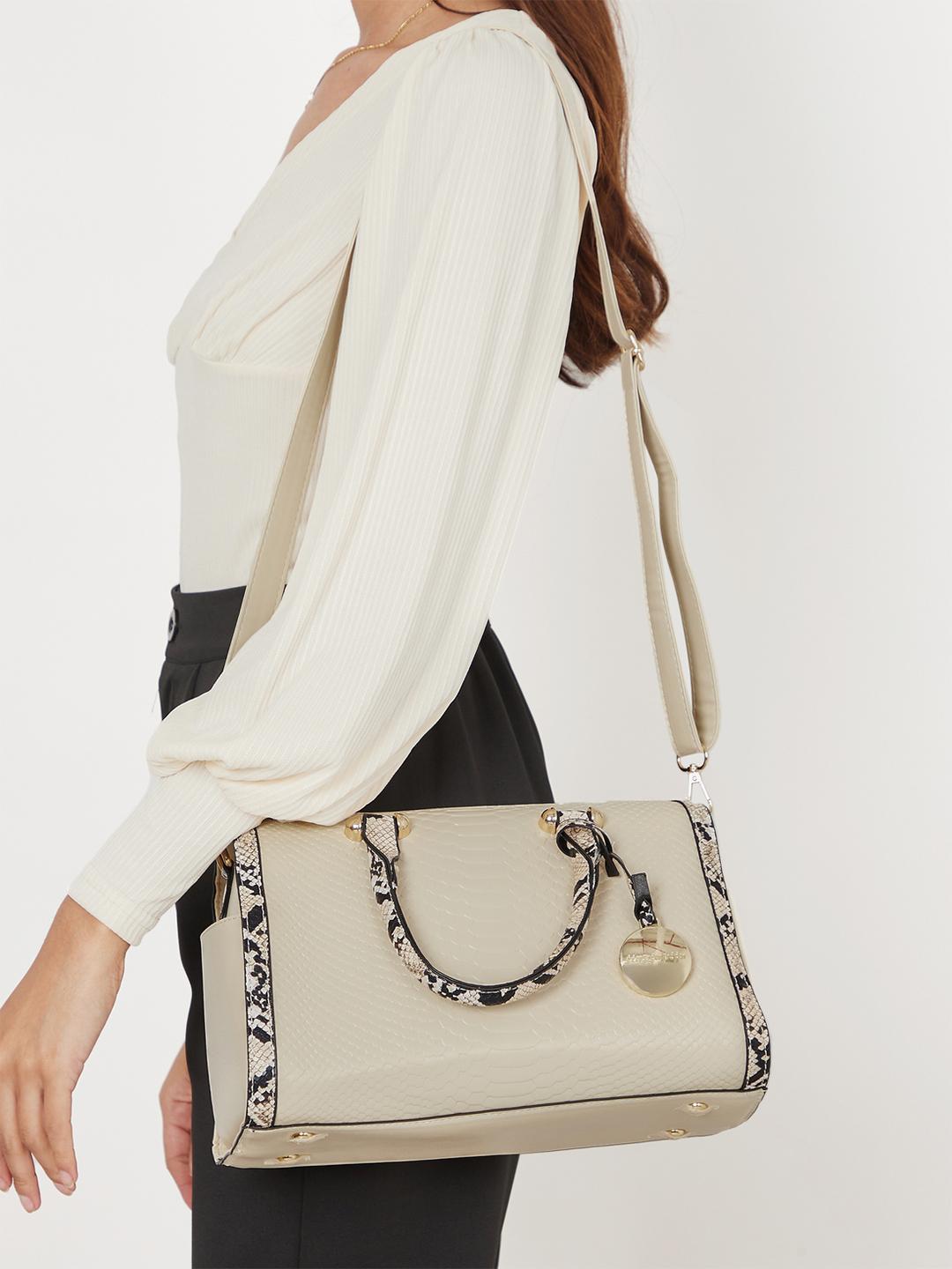 Buy Styli Snakeskin Textured Handheld Bag With Tasselled - Handbags for ...