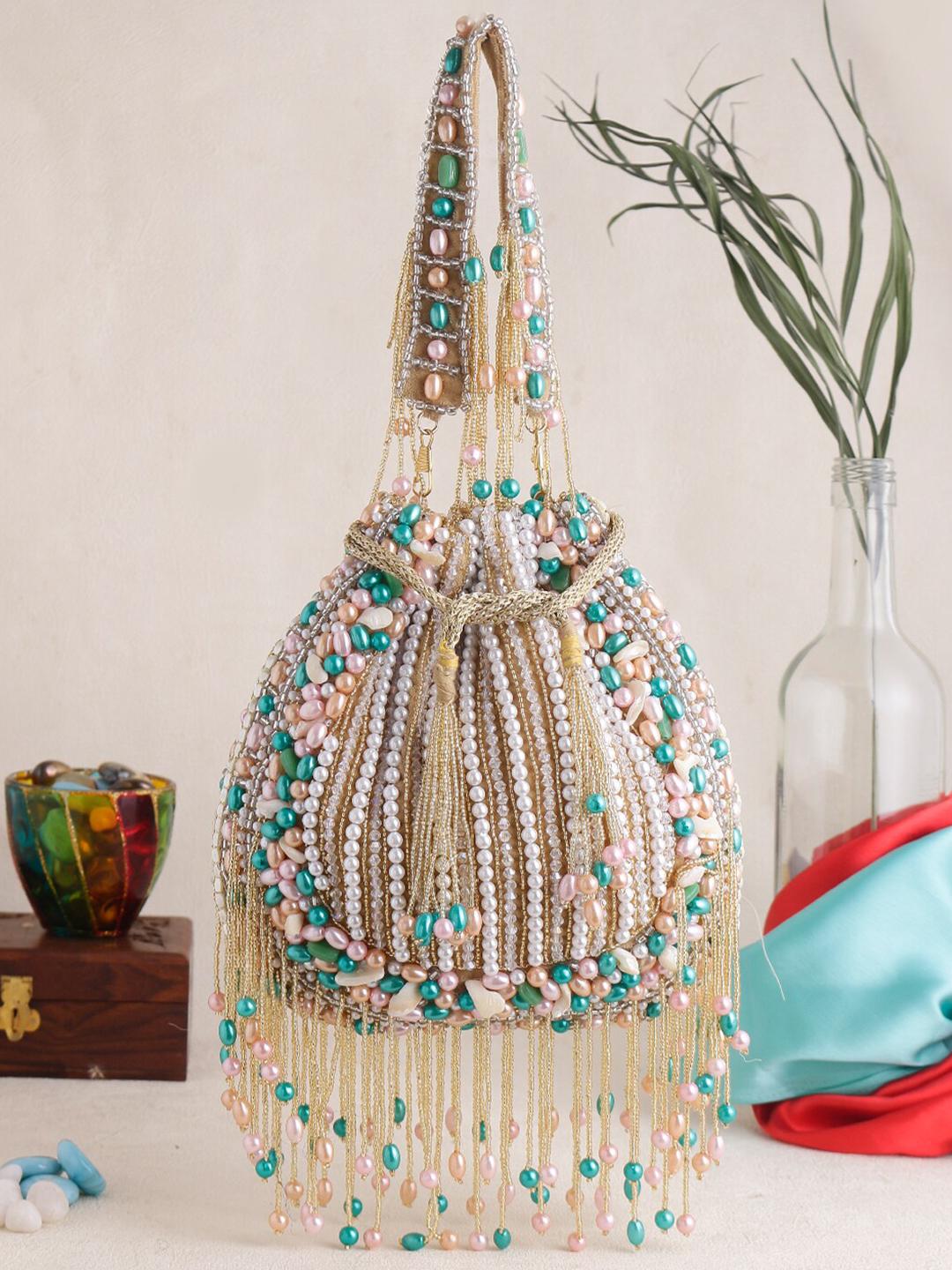 Buy Swisni Water Resistant Embellished Potli Clutch - Clutches for ...