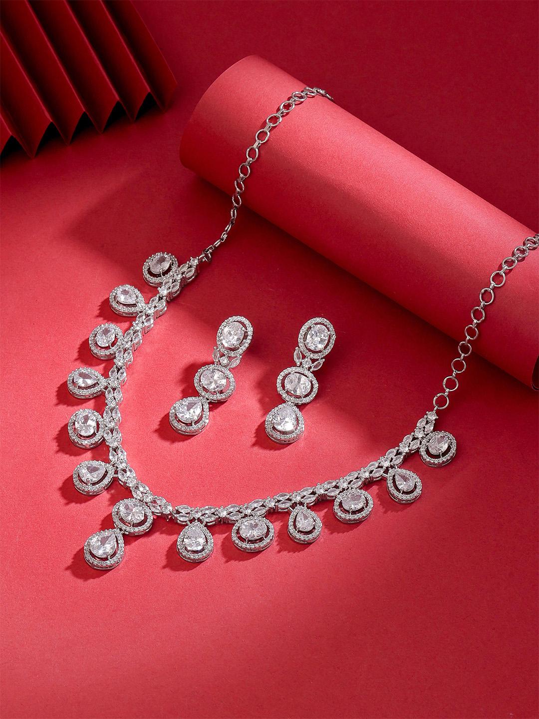 Buy Yellow Chimes Rhodium Plated American Diamond Studded Jewellery Set ...