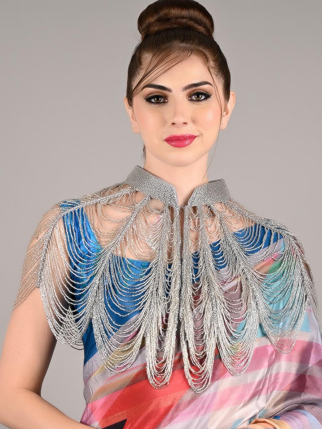 Buy ODETTE Embellished Tasseled Acrylic Cape Shrug - Shrug for Women ...