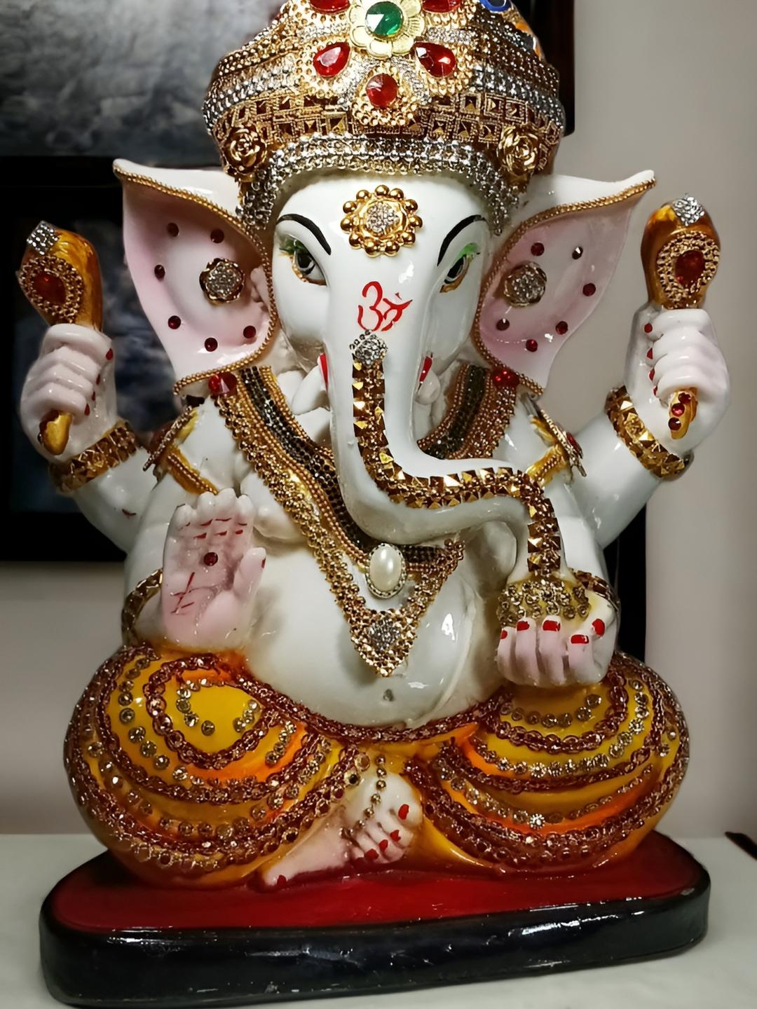 Buy SANKALAN CREATIONS Dressed Ganesh Ji White Polyresin Metallic ...