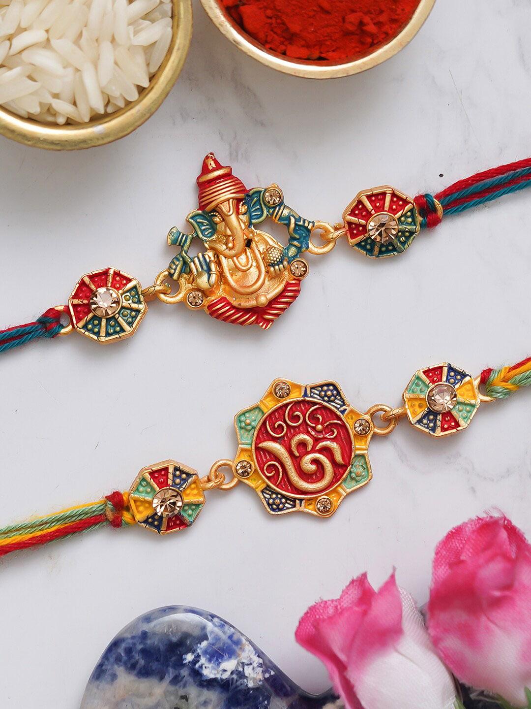 Buy ECraftIndia Set Of 2 Ganesha And Om Symbol Rakhi With Roli Chawal ...