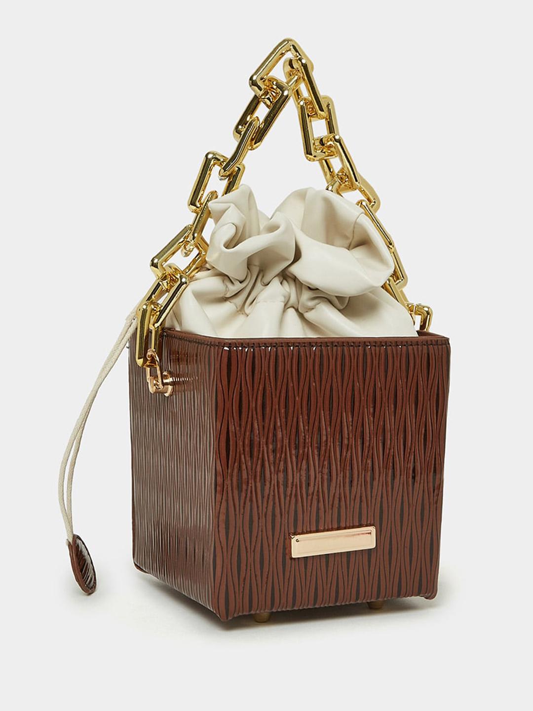 Buy Styli Women's Brown Textured Drawstring Closure Hand Bag With Wide ...