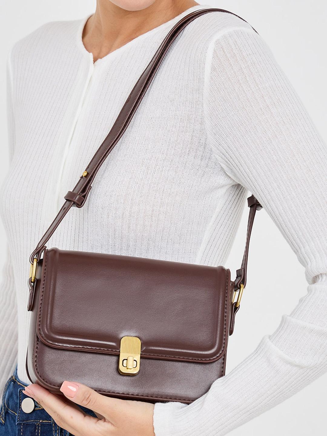 Buy Styli Twisted Mini Shoulder Bag - Handbags for Women 29405436 | Myntra