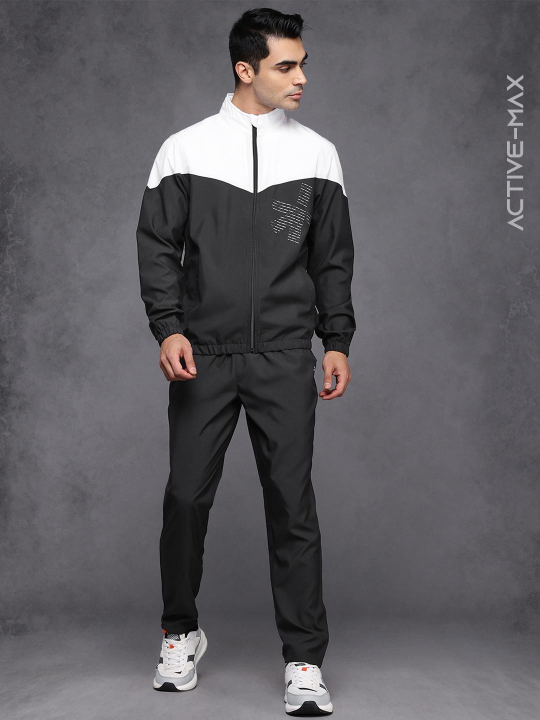 Buy HRX By Hrithik Roshan Men Rapid Dry Self Design Colourblocked ...