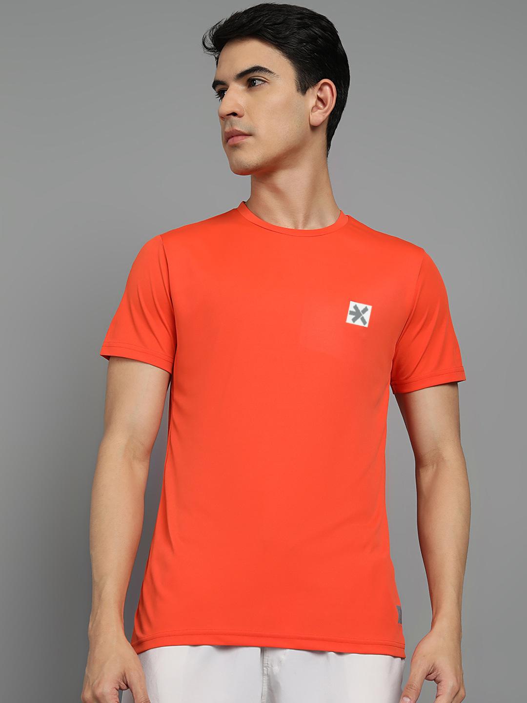Buy HRX By Hrithik Roshan Men Solid Round Neck T Shirt - Tshirts for ...
