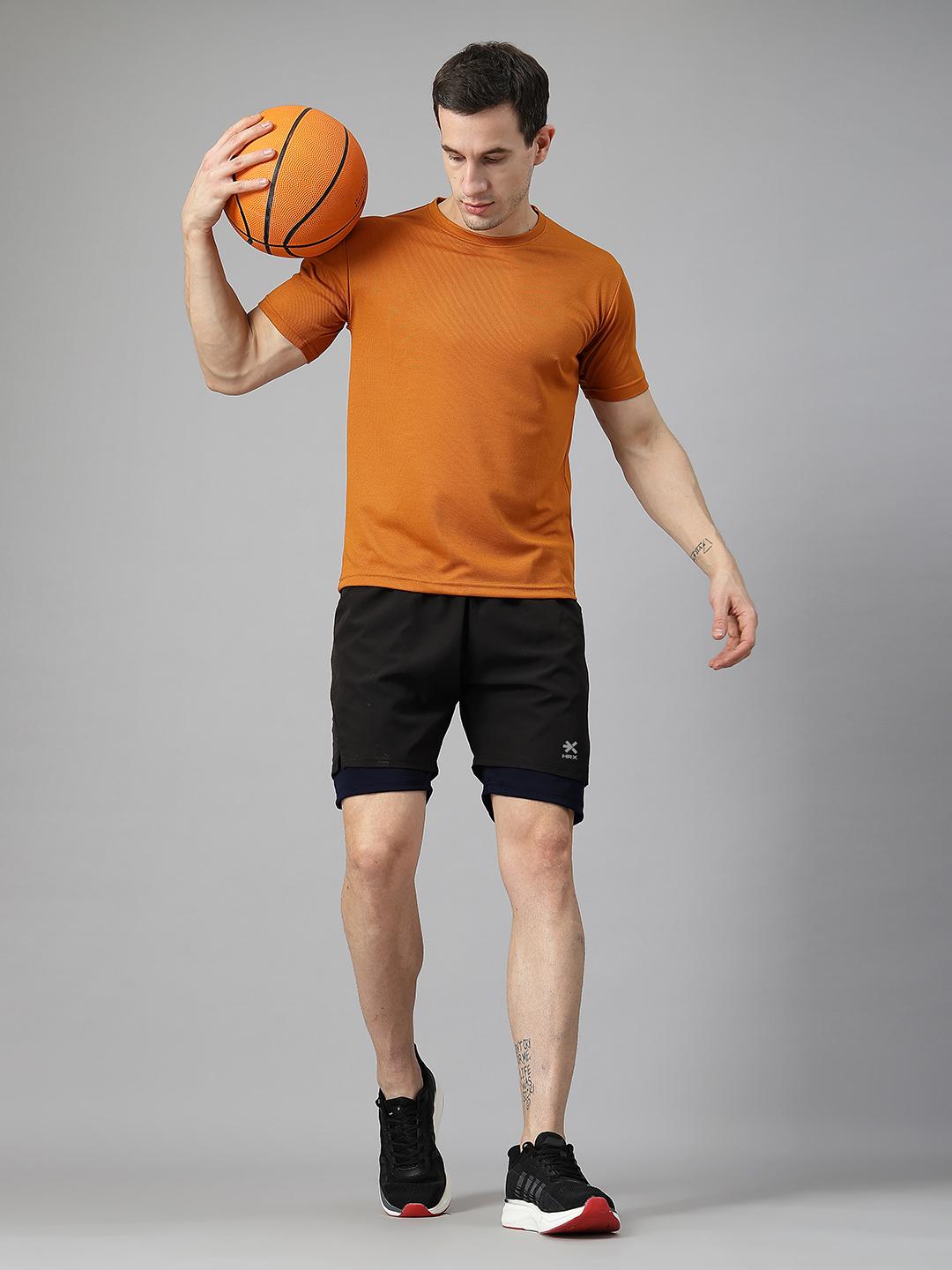 Buy HRX By Hrithik Roshan Men Solid Double Layered Regular Fit Sports ...