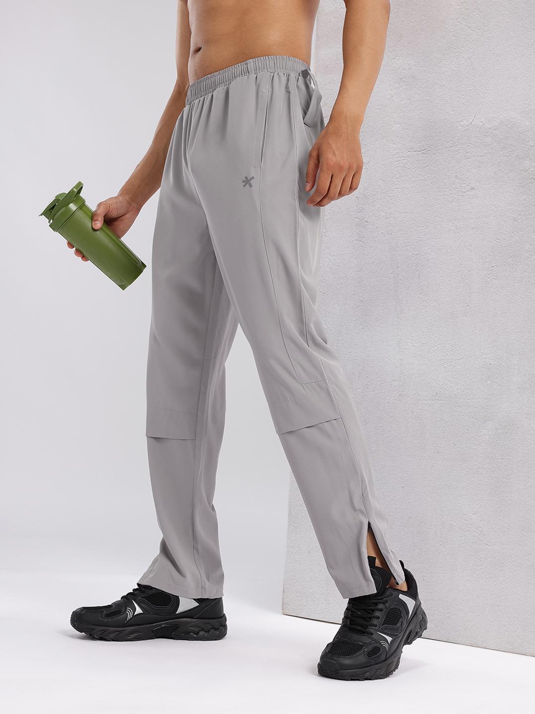 Buy HRX By Hrithik Roshan Men Zipped Hem Rapid Dry Training Track Pants ...