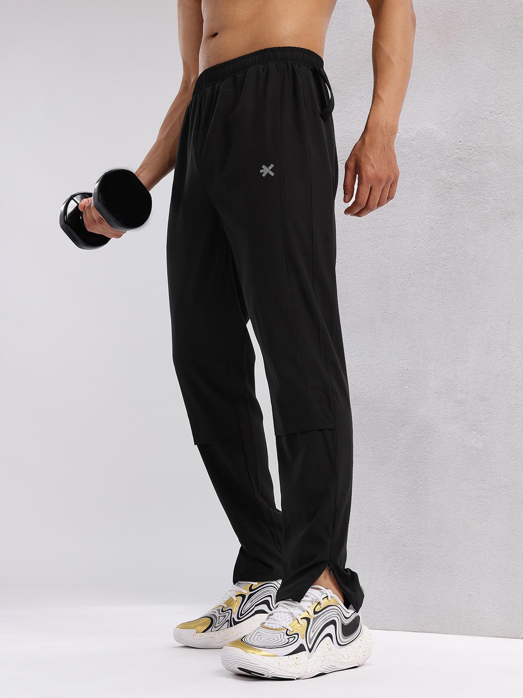 Buy HRX By Hrithik Roshan Men Zipped Hem Rapid Dry Training Track Pants ...