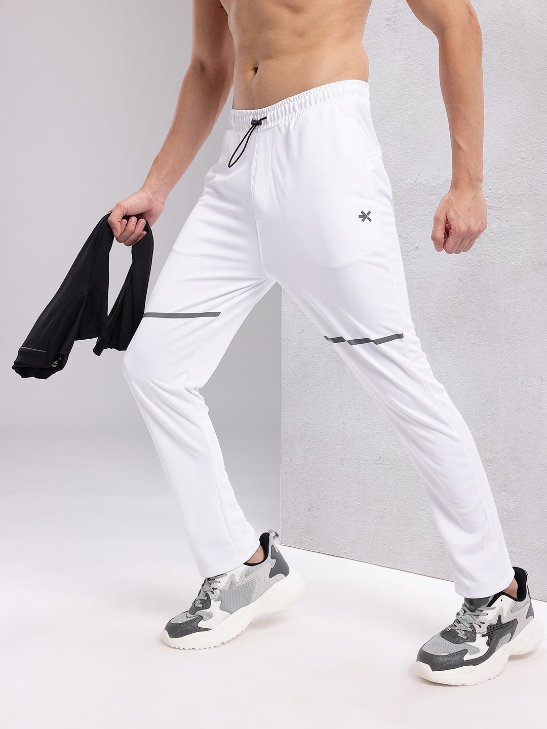 Buy HRX By Hrithik Roshan Men Mid Rise Rapid Dry Running Track Pants ...