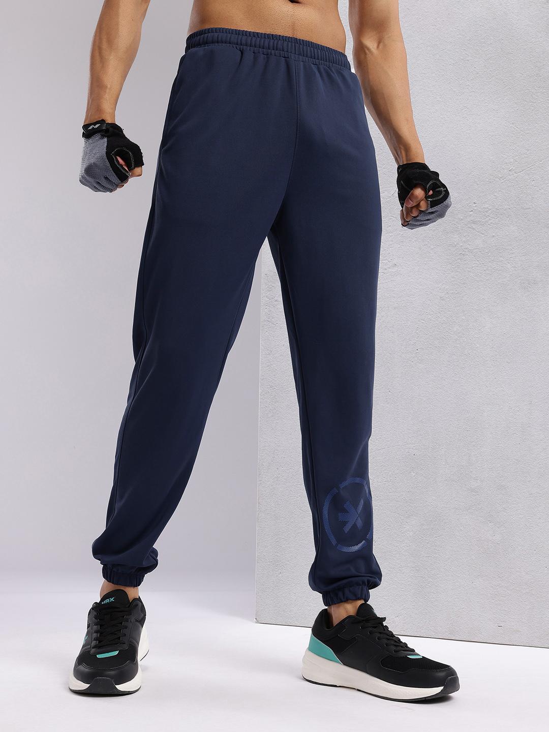Buy HRX By Hrithik Roshan Men Brand Logo Printed Rapid Dry Training ...