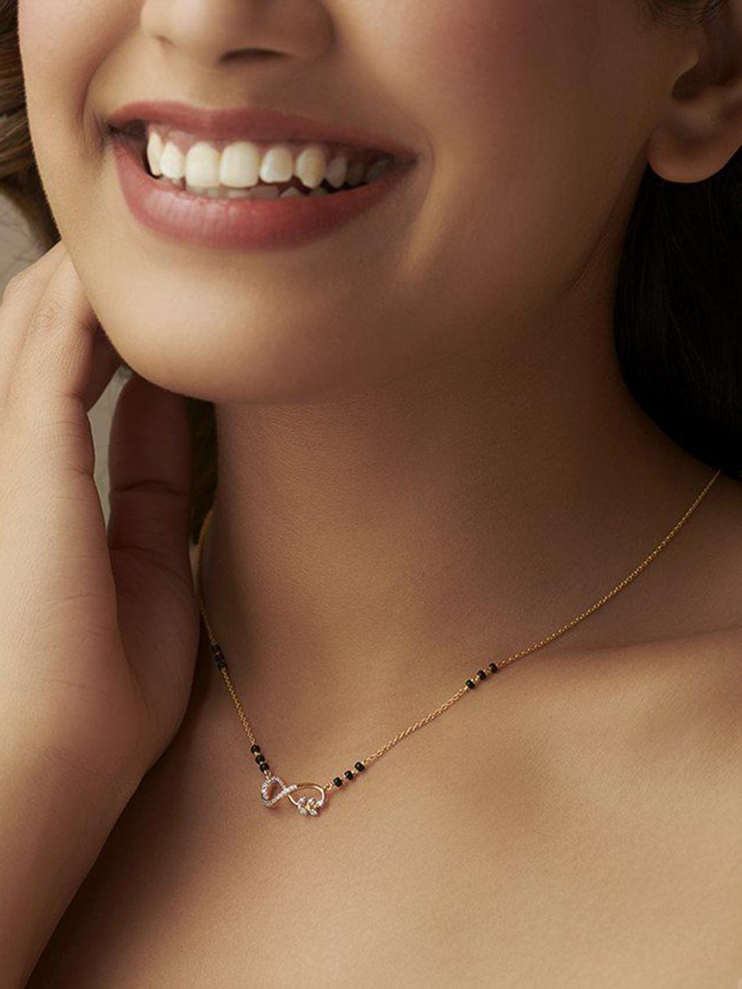 Buy Anouk Gold Plated Cubic Zirconia Studded And Beaded Infinity ...