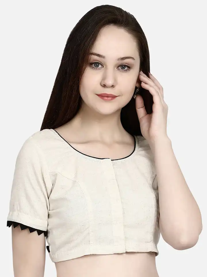 cream colored blouse