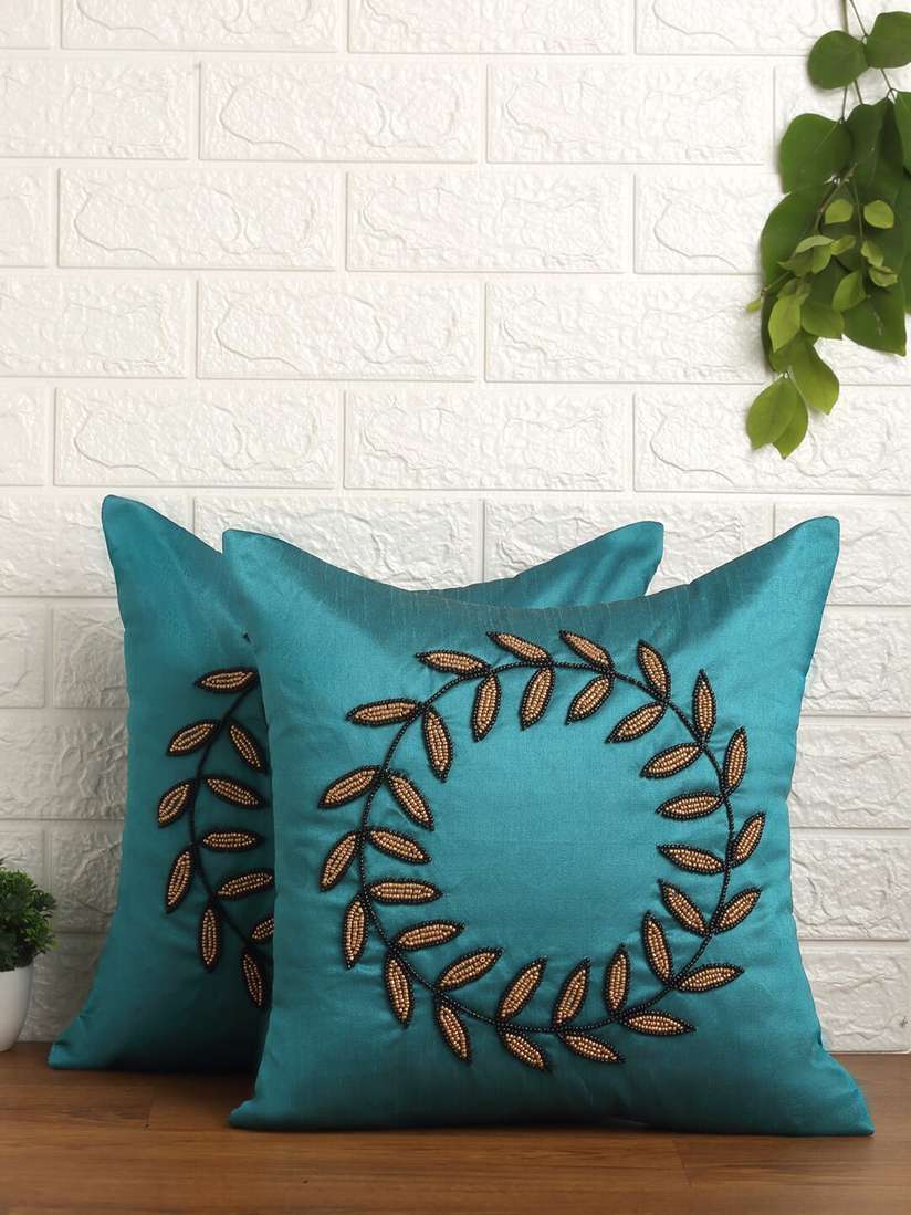 dark teal patterned cushions